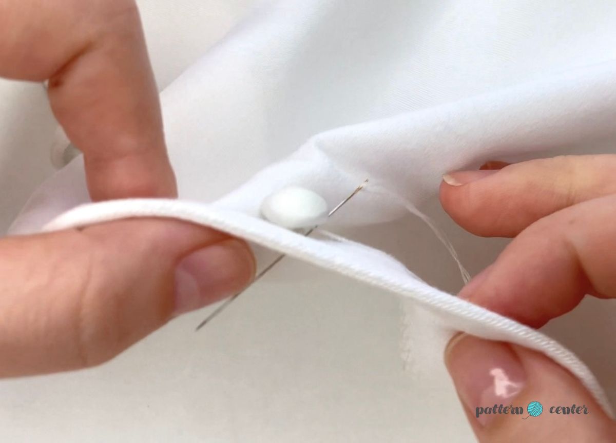 How to Sew a Button on a Shirt by Hand (With Photos & Video)