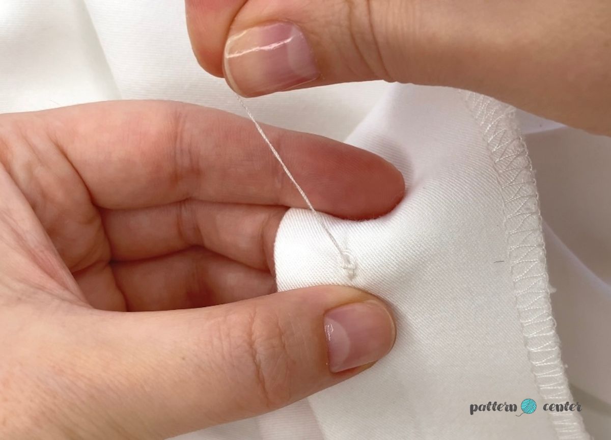 How to Sew a Button on a Shirt by Hand (With Photos & Video)