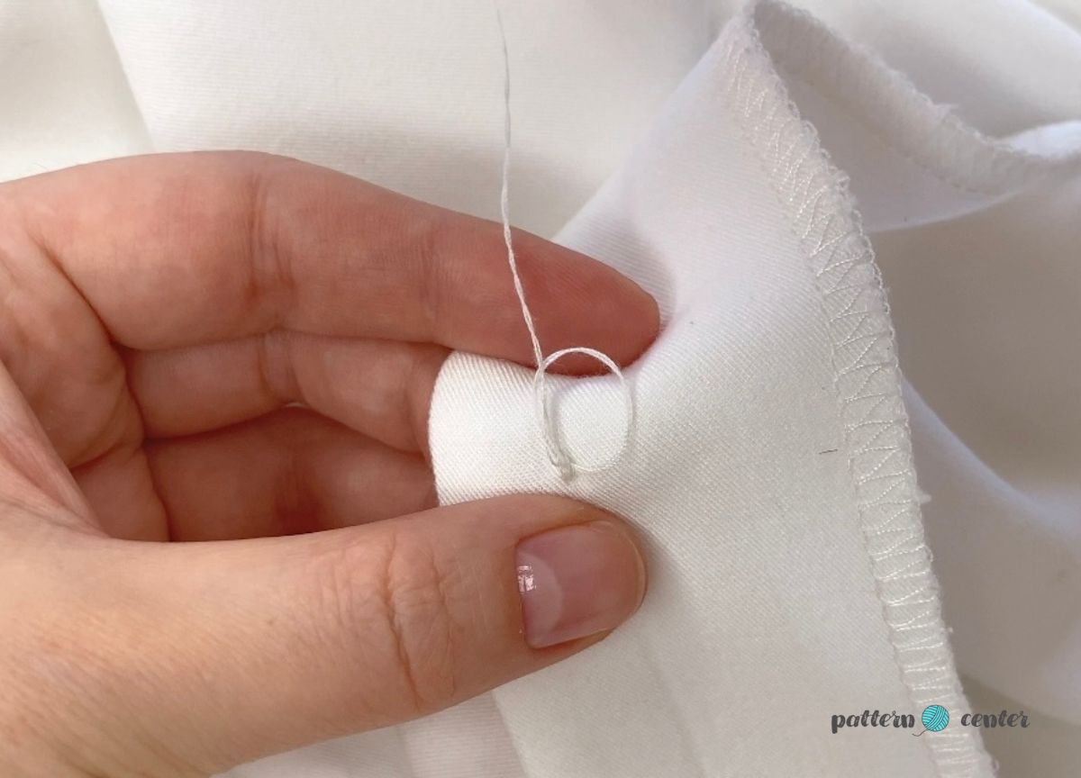 How to Sew a Button on a Shirt by Hand (With Photos & Video)