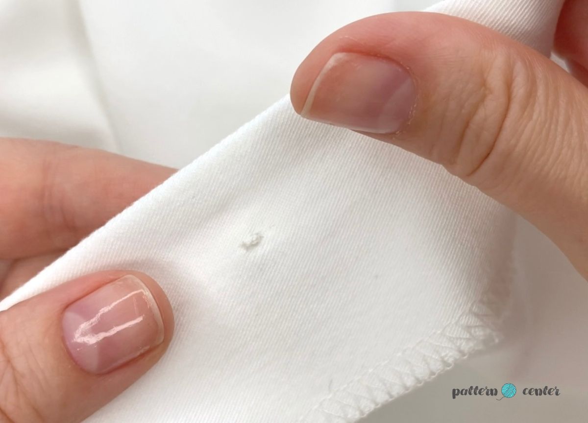 How to Sew a Button on a Shirt by Hand (With Photos & Video)