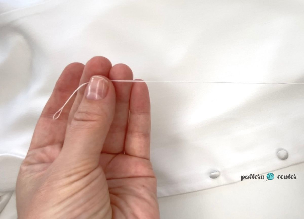 How to Sew a Button on a Shirt by Hand (With Photos & Video)